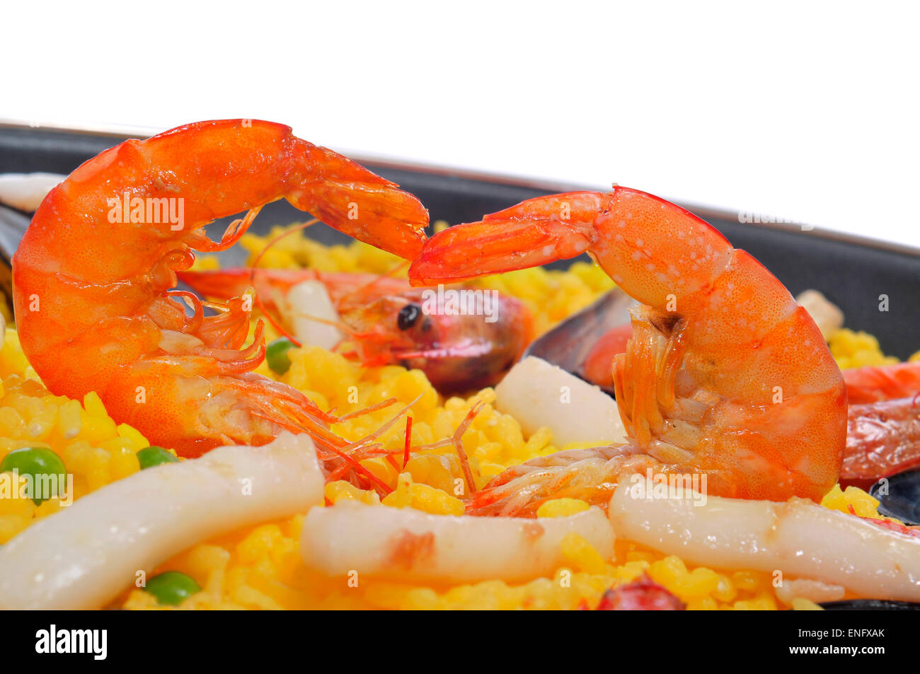 closeup of a typical paella from Spain on a white background Stock ...