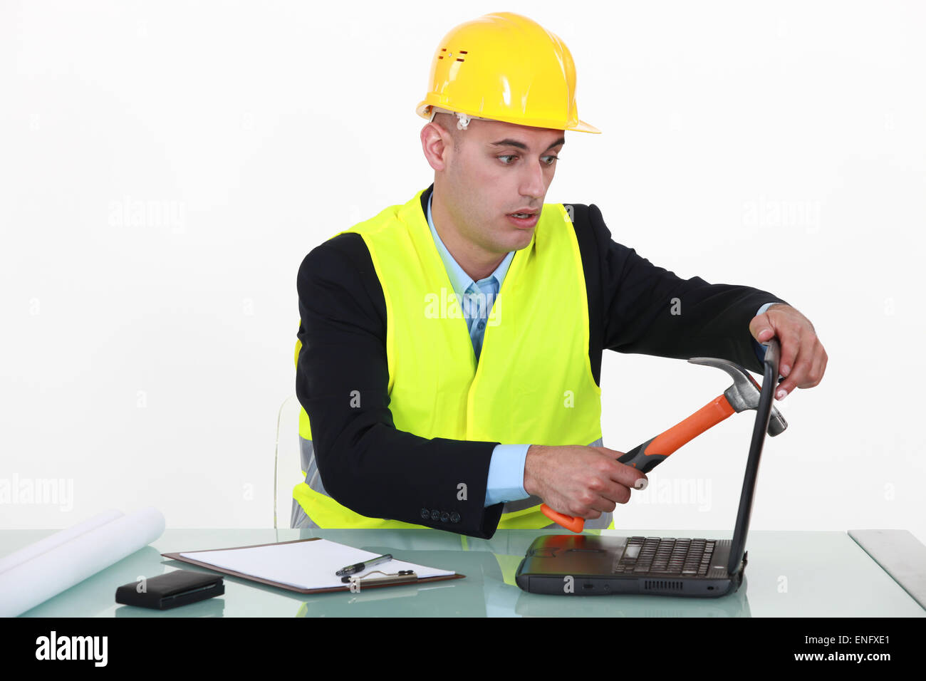 Man smashing computer with hammer hi-res stock photography and images ...
