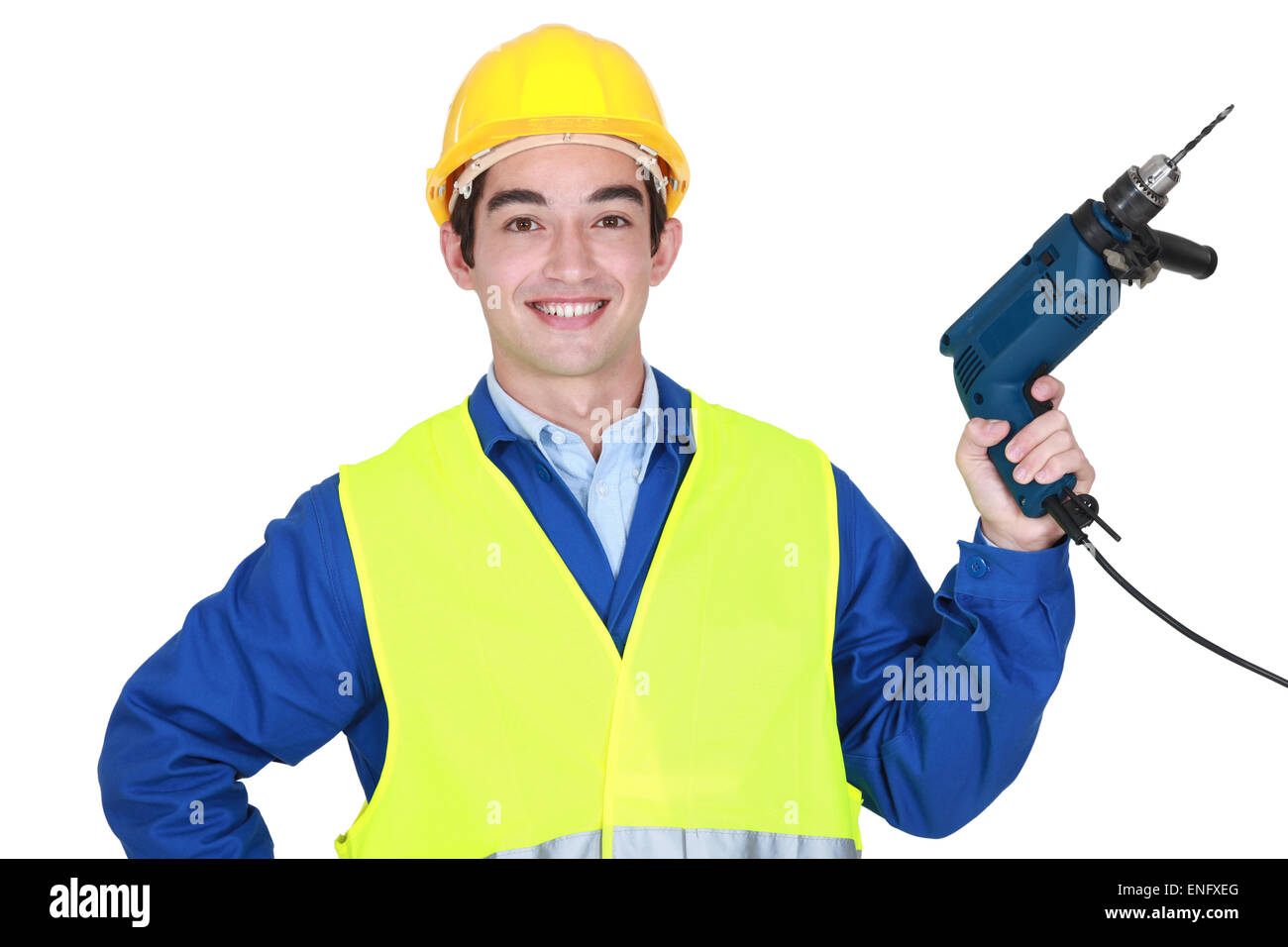 Worker holding a power tool Stock Photo - Alamy