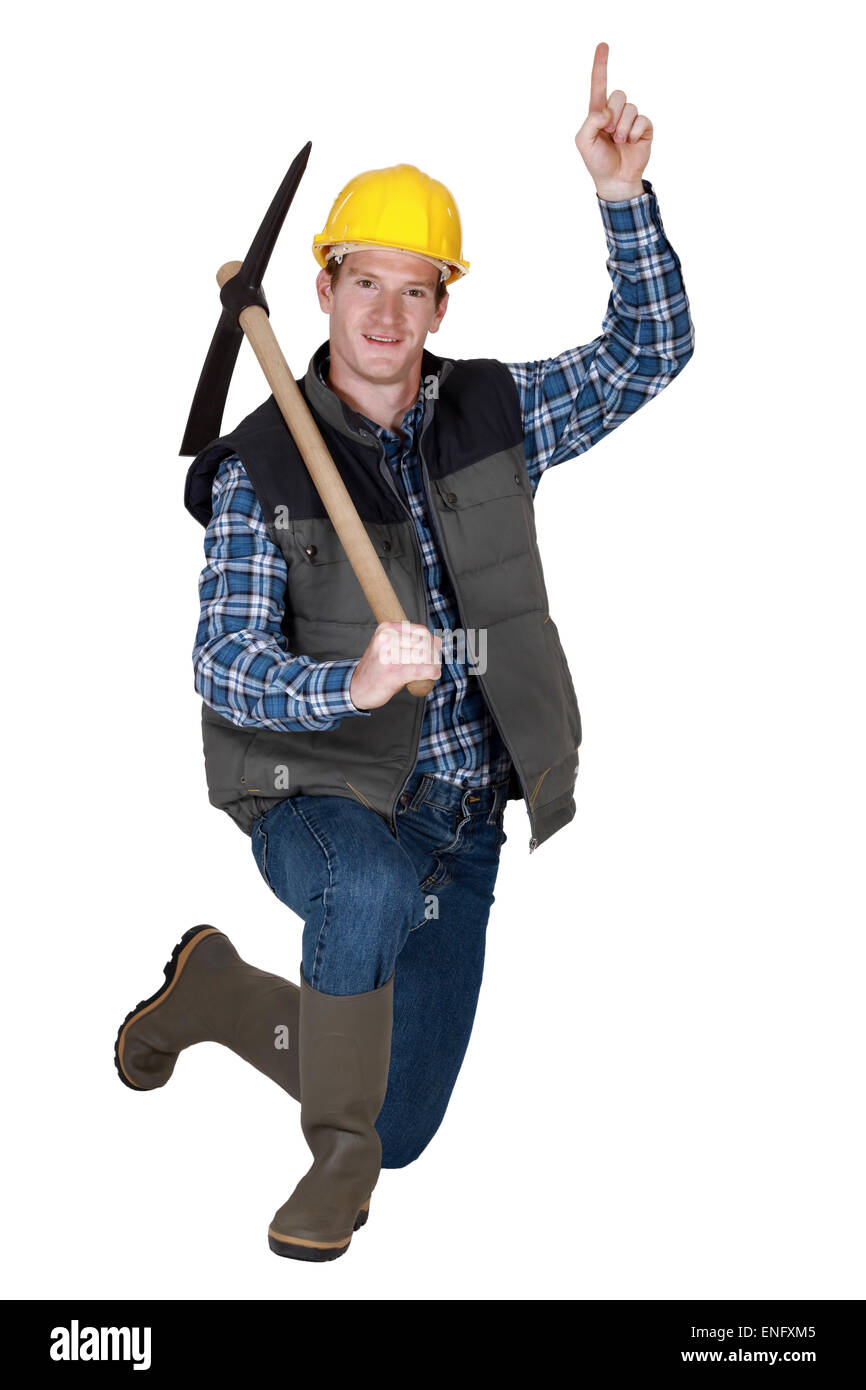 Man with pick-axe Stock Photo - Alamy
