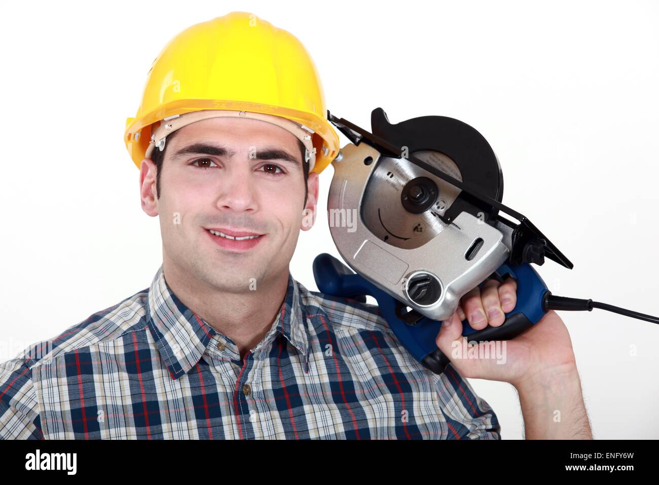 Workman with a circular saw Stock Photo - Alamy
