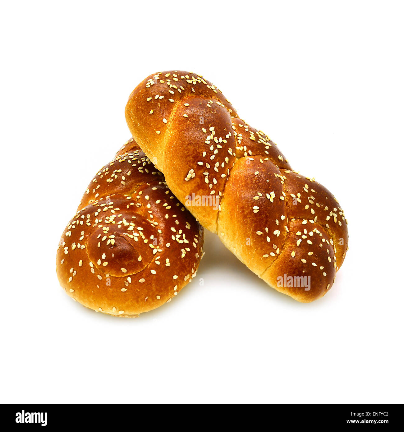 Two buns with sesame seeds on a white background Stock Photo - Alamy