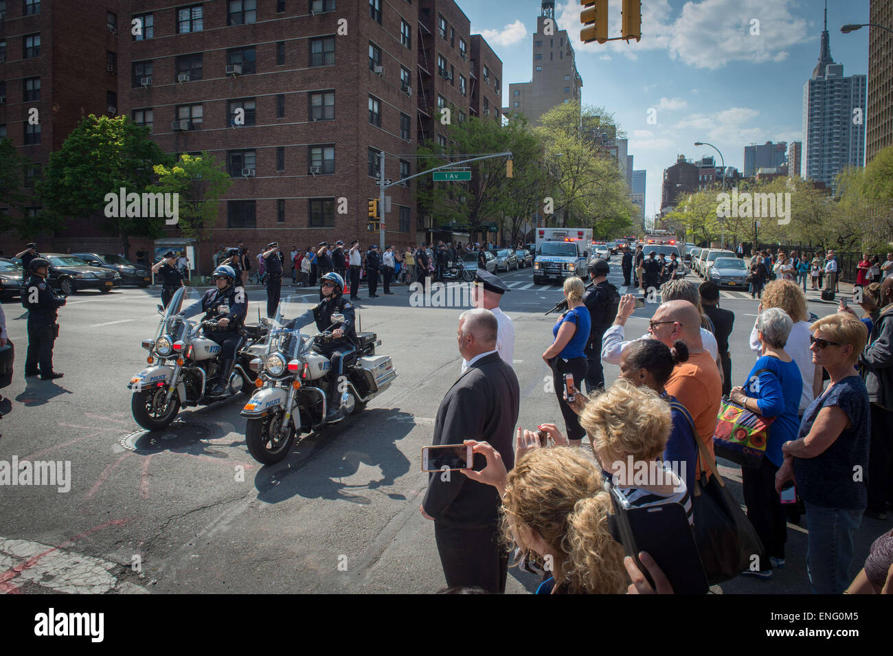 Manhattan, New York, USA. 4th May, 2015. Police officers salute as the ...