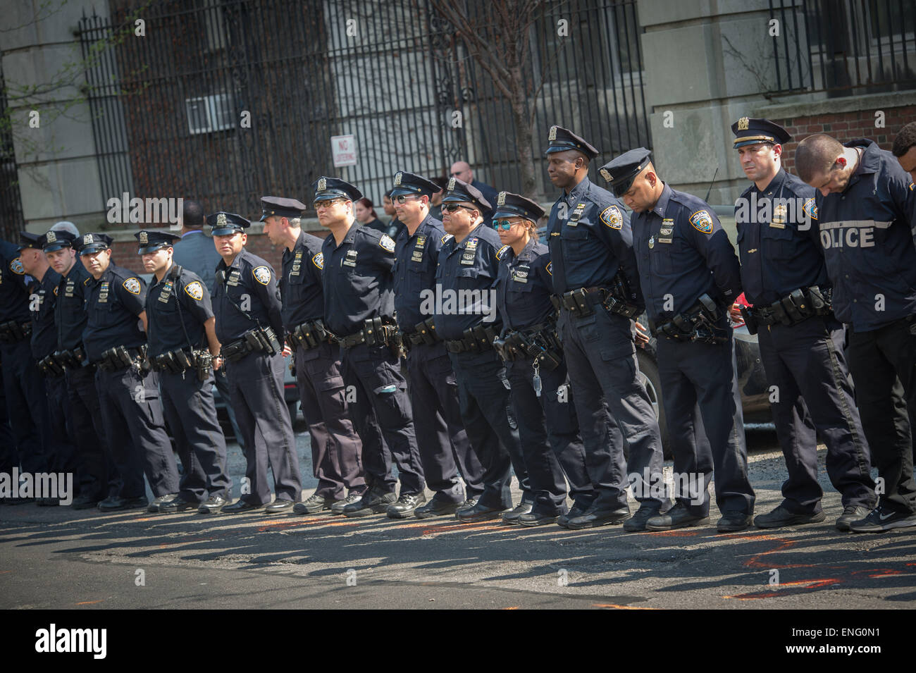 Manhattan, New York, USA. 4th May, 2015. Police officers line up before ...