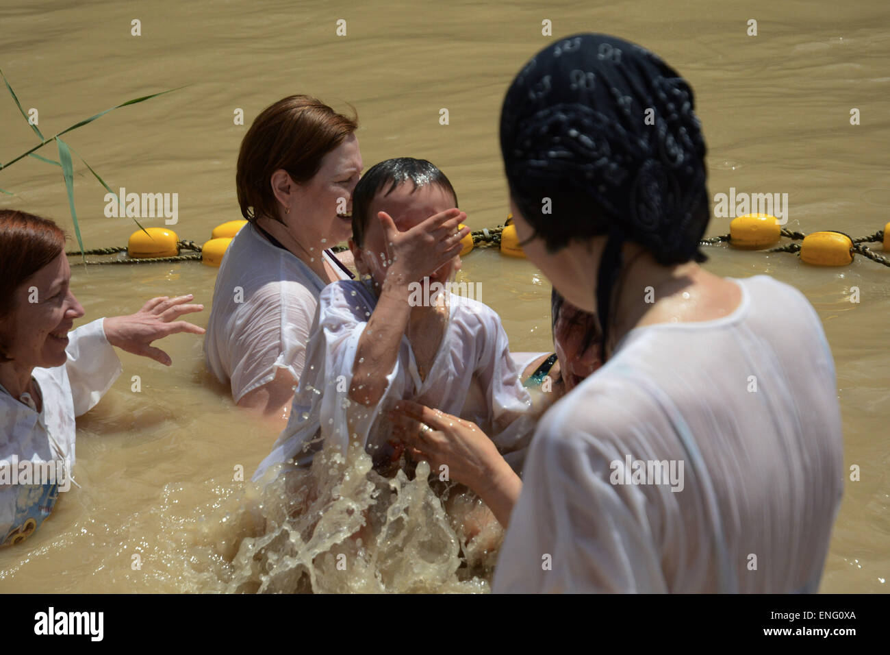 A group of Russian pilgrims at the site of Jesus baptism, on the banks ...