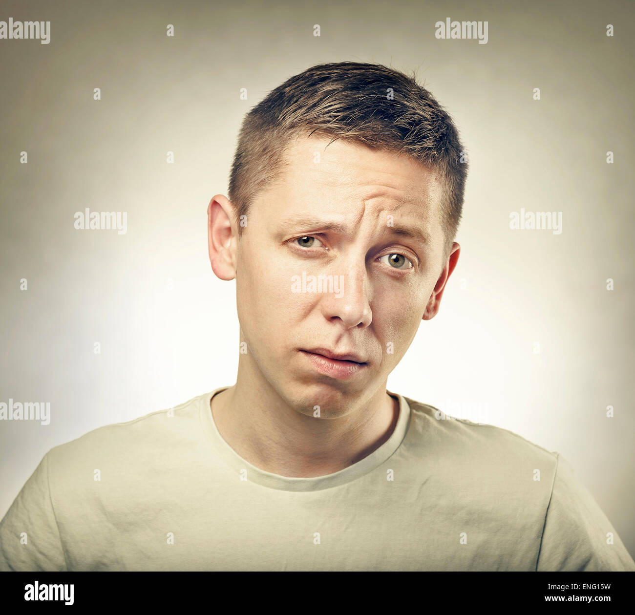 Young bored man Stock Photo - Alamy