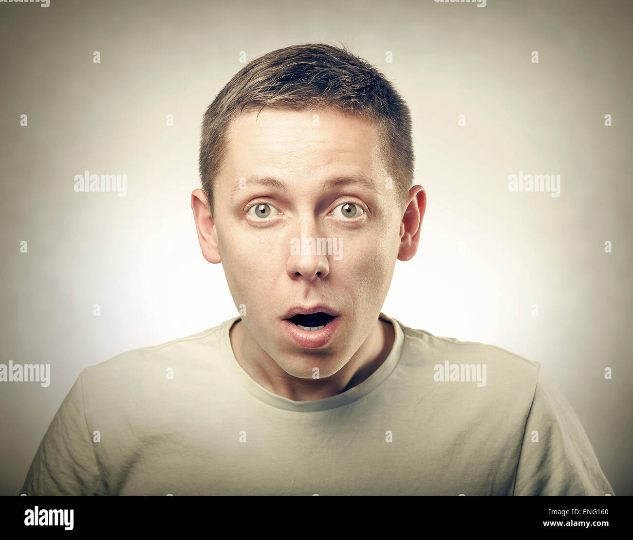 Surprised Young Man Stock Photo - Alamy