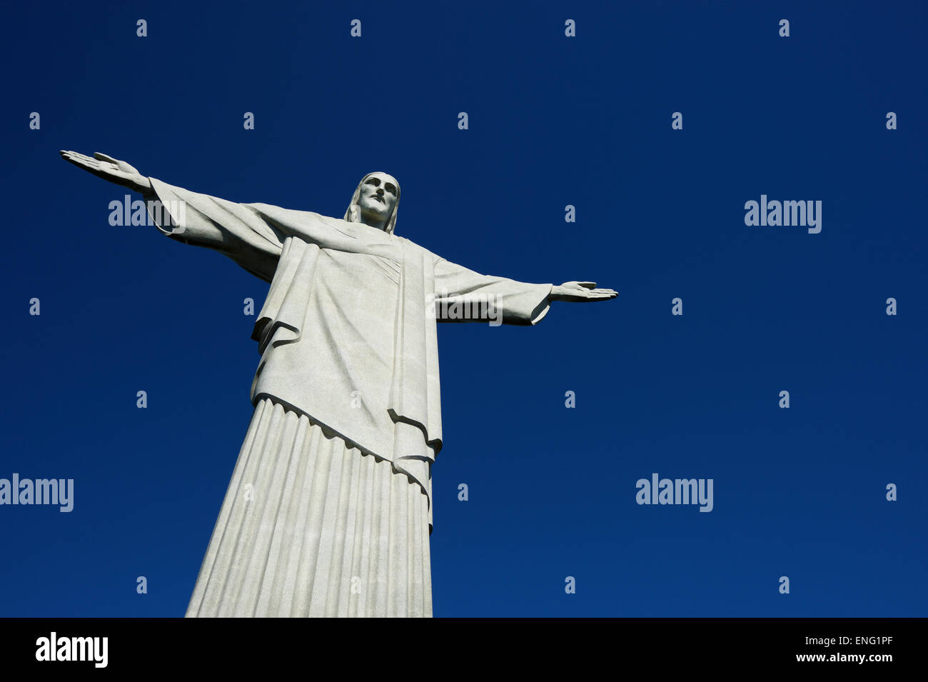 Corcovado Christ the Redeemer statue standing under bright tropical sun ...