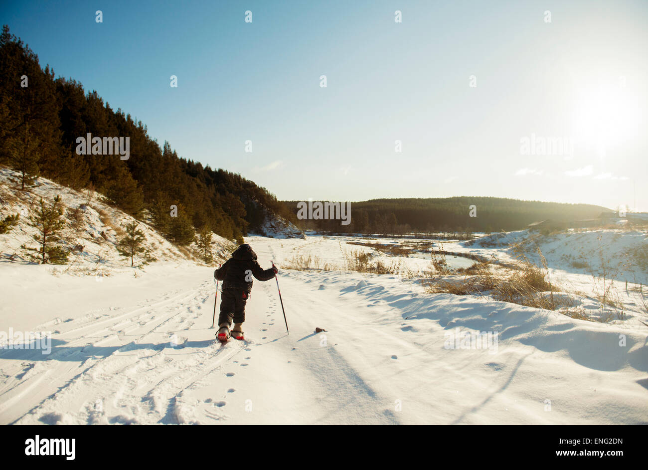 Caucasian boy cross-country skiing in snowy field Stock Photo - Alamy