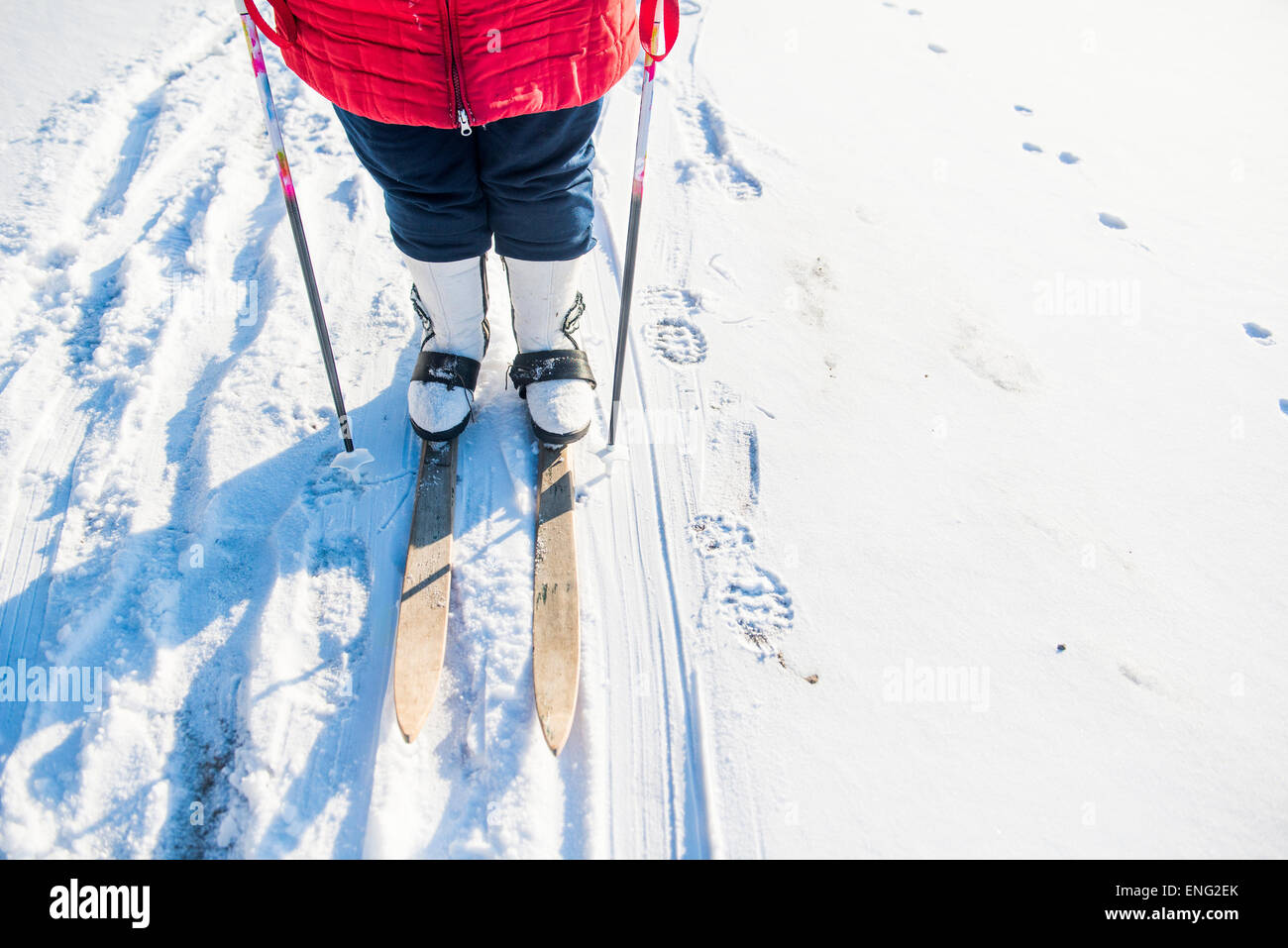 Caucasian woman cross-country skiing in snowy field Stock Photo - Alamy
