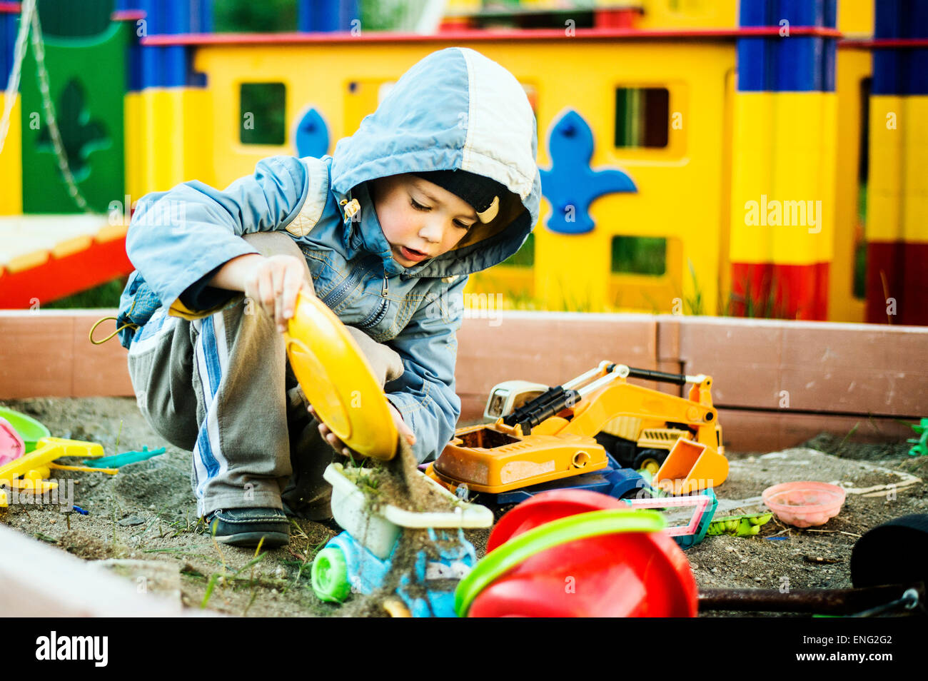 Caucasian boy playing in sandbox Stock Photo - Alamy
