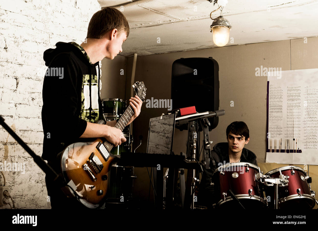 Two male musicians performing together hi-res stock photography and ...