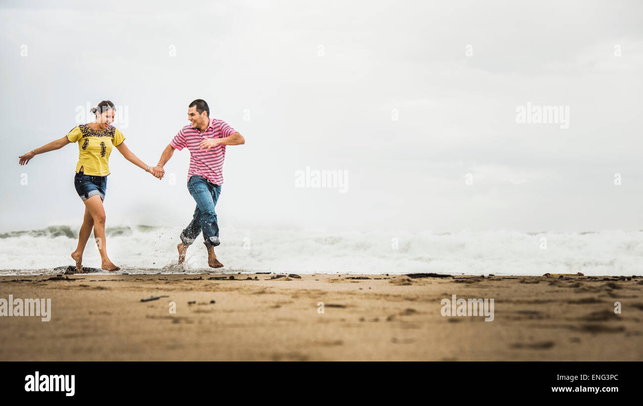 Man Running Into Waves High Resolution Stock Photography and Images - Alamy