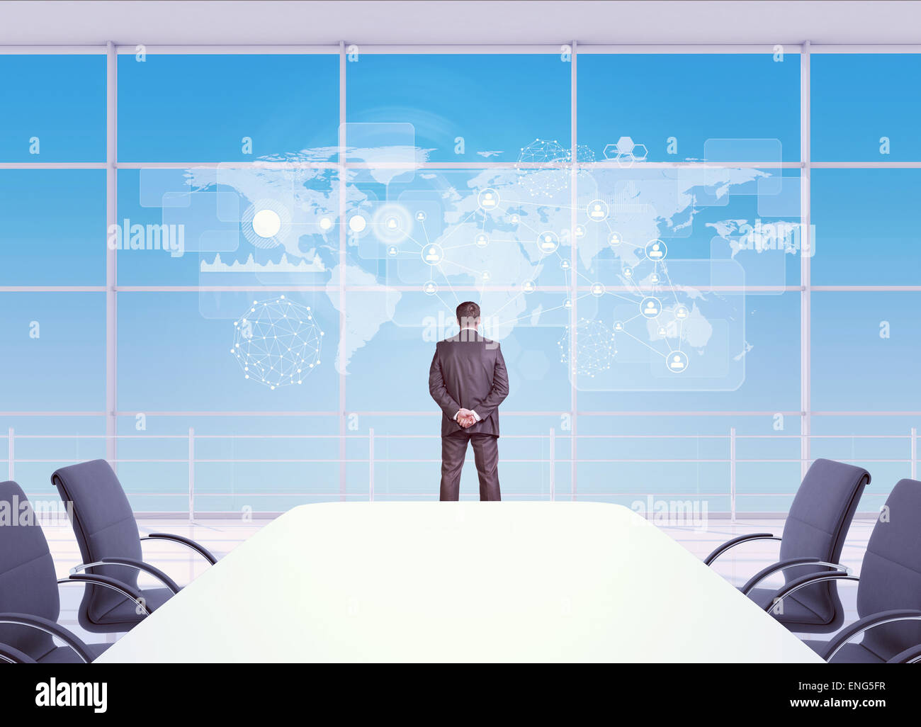 Businessman standing in office Stock Photo - Alamy