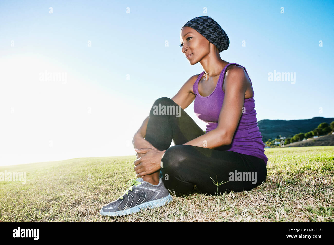 African woman side view sitting hi-res stock photography and images - Alamy