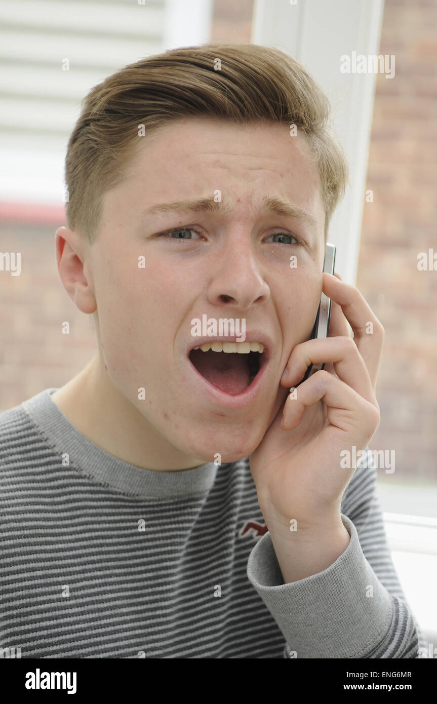 Teenage Boy Talking On His Mobile Phone Stock Photo - Alamy Teenage Boy Talking On His Mobile Phone Stock Photo - Alamy