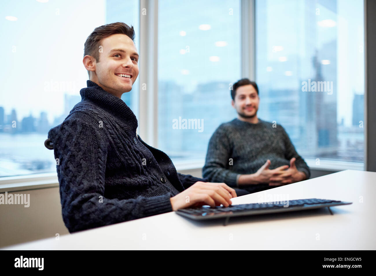 Black man in office desk hi-res stock photography and images - Alamy