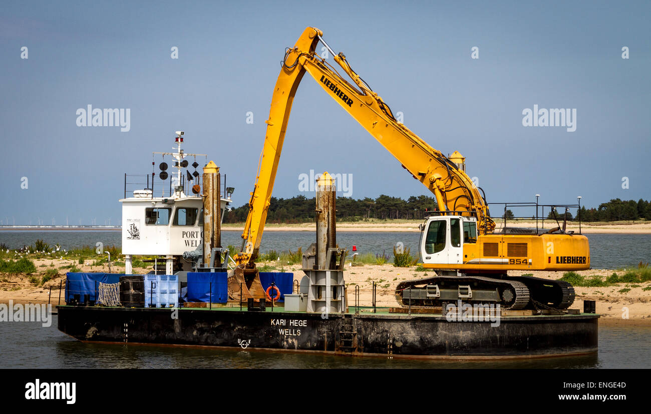 Dredger and Digger in Outer Harbour Area around Wells next the Sea ...