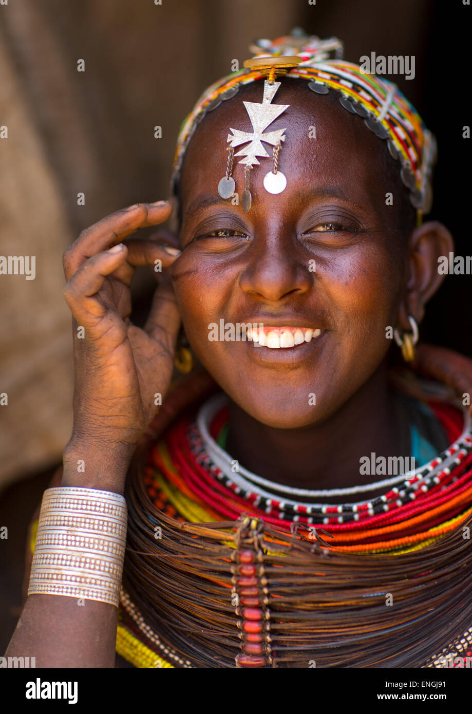 Rendille Tribeswoman Wearing Traditional Headdress And Mpooro Engorio ...