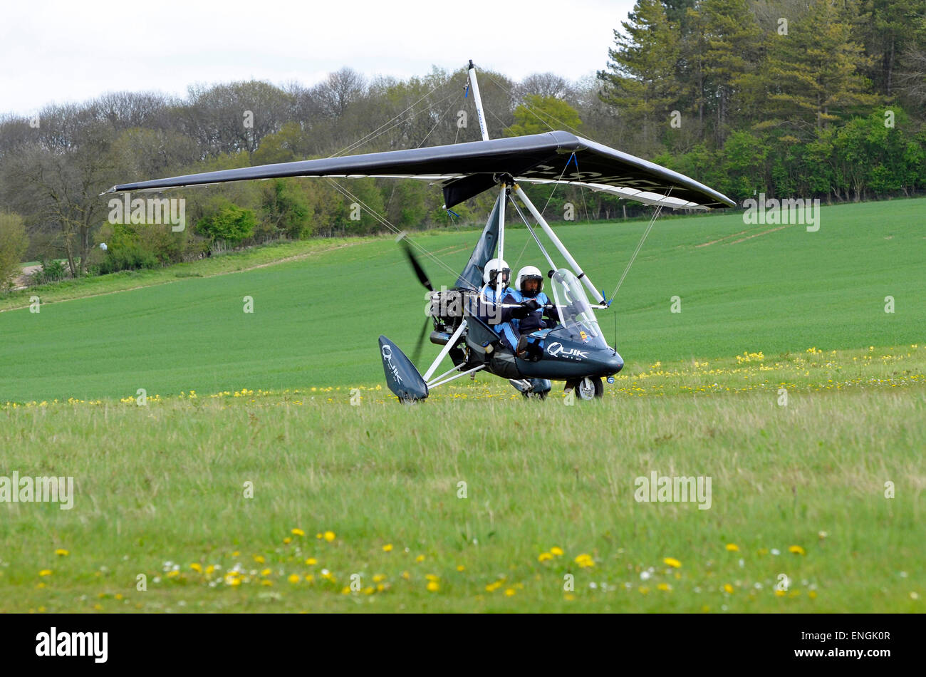 A Pegasus Quick 912 flex-wing microlight aircraft lands on the grass ...