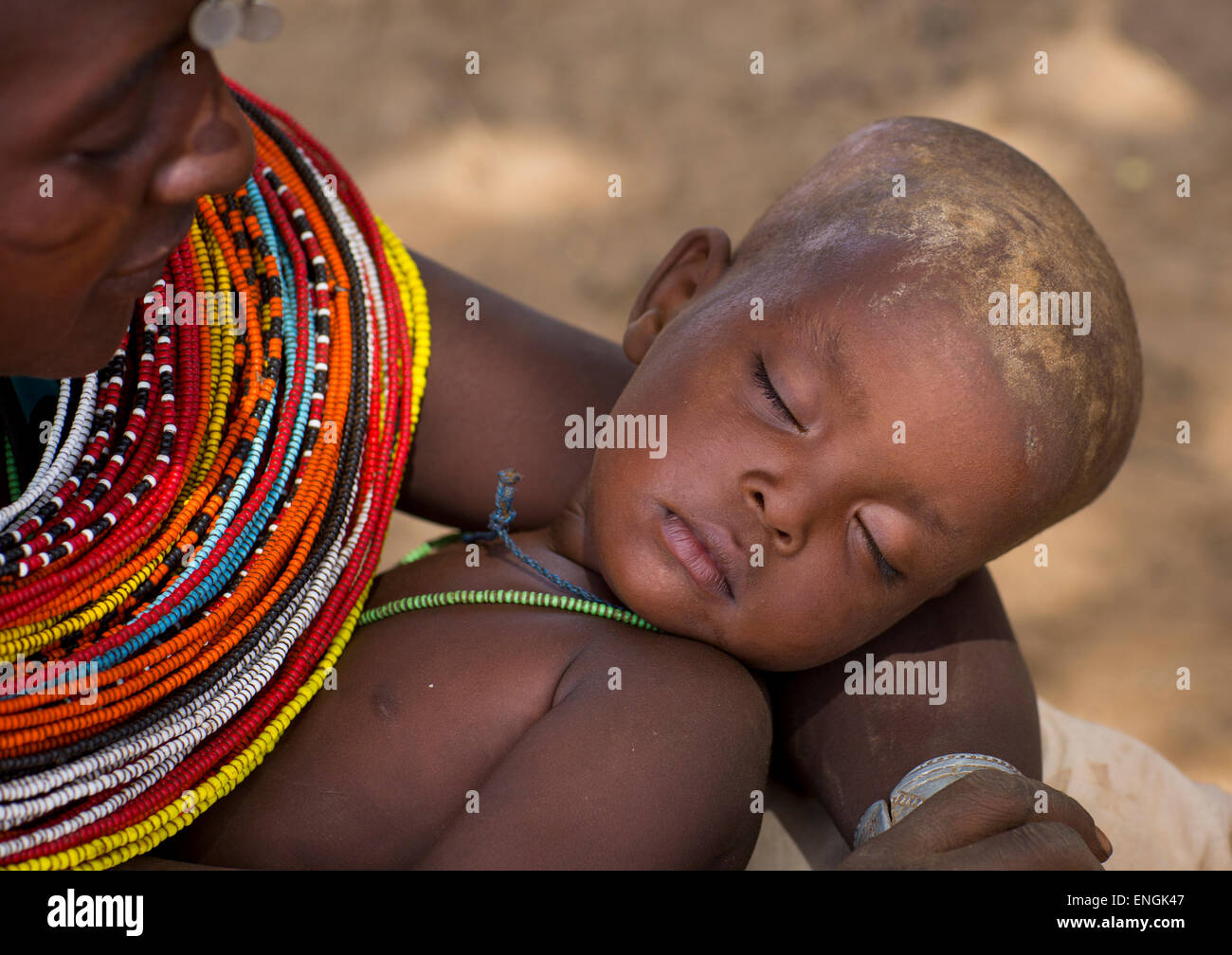Rendille Tribeswoman Holding Her Sleeping Baby, Marsabit District ...