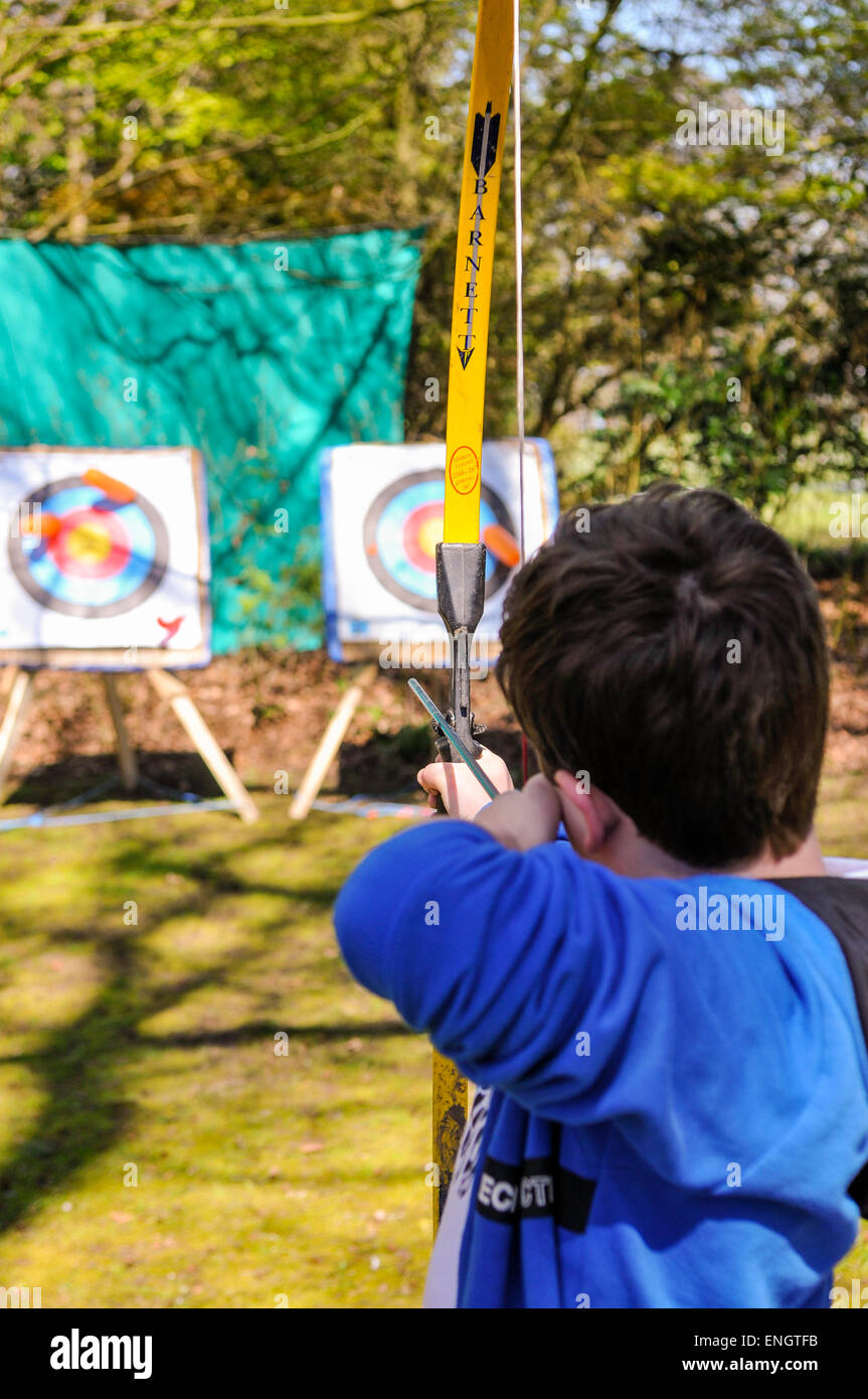 Boy with bow hi-res stock photography and images - Alamy
