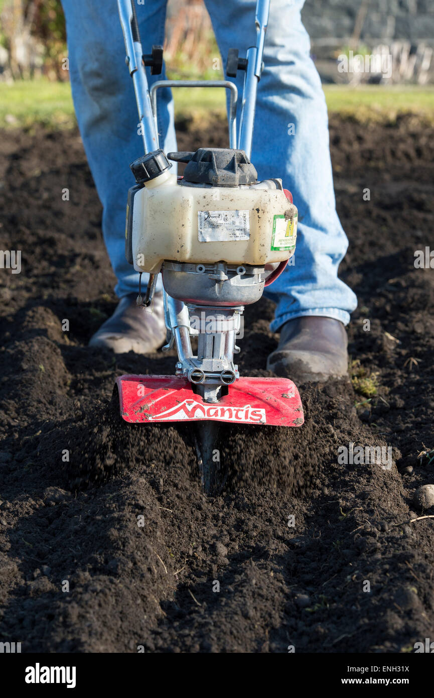 Rotavating garden hi-res stock photography and images - Alamy