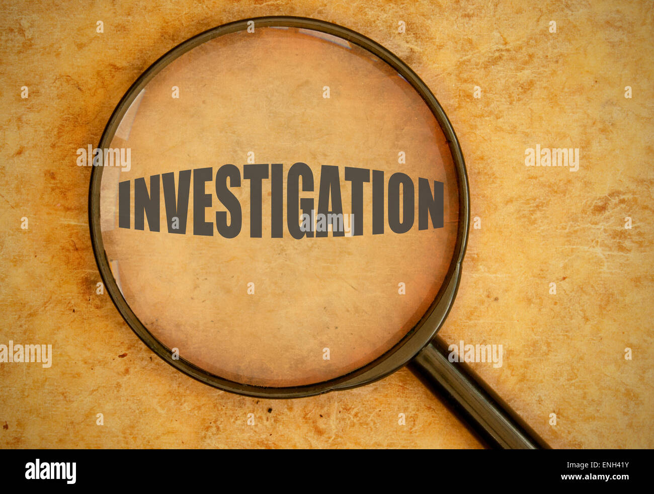 Magnifying glass focused on investigation Stock Photo - Alamy