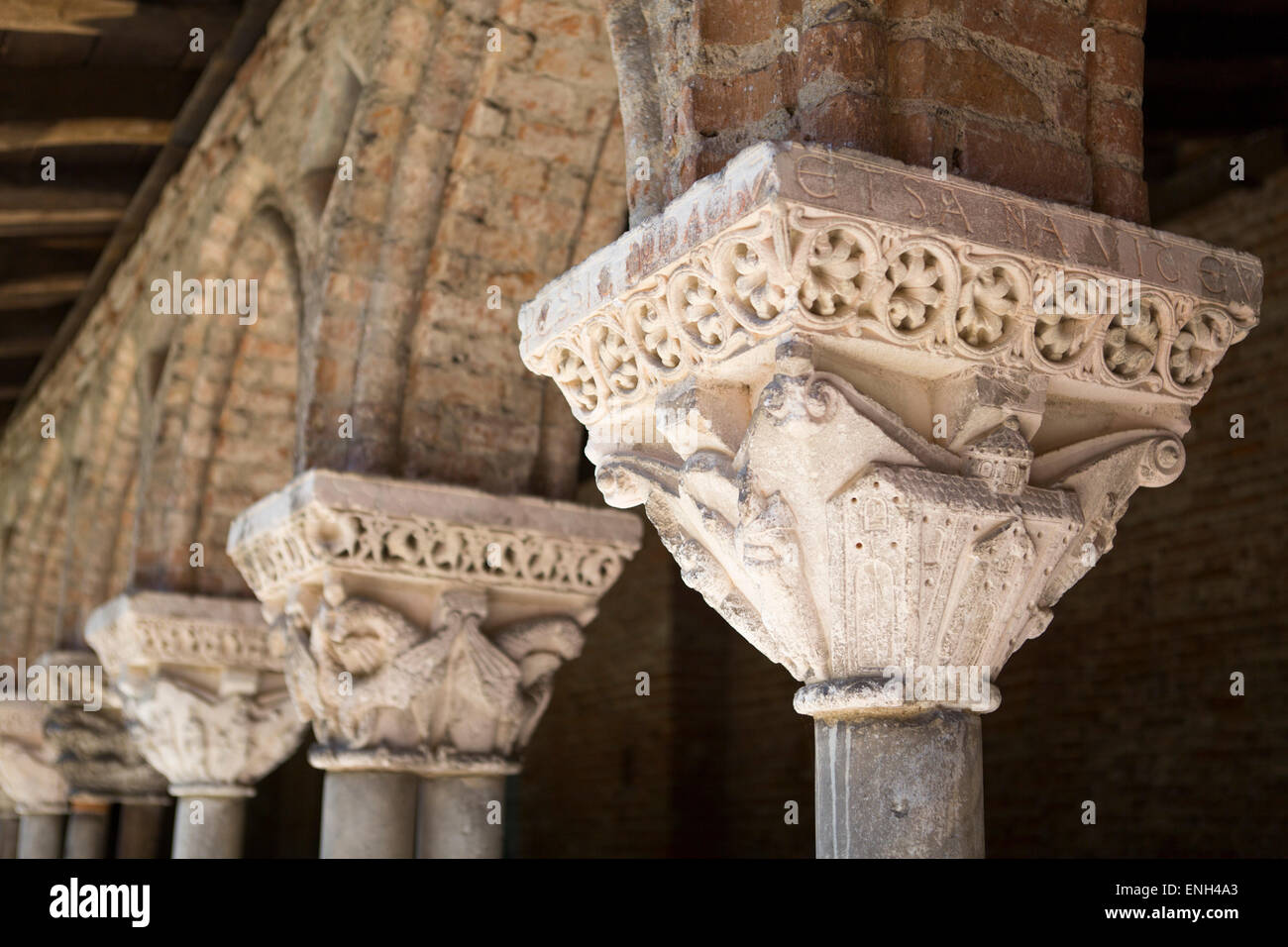 Arcade with beautiful decorations at the Saint-Pierre Abbey in Moissac ...