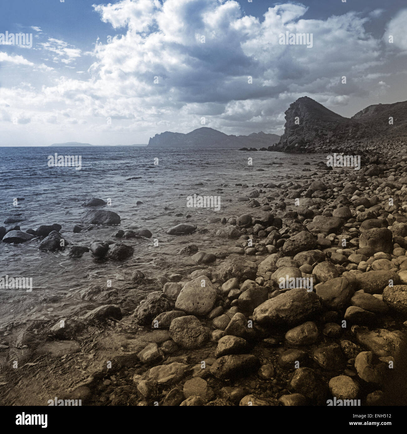 Stones in the surf Stock Photo - Alamy