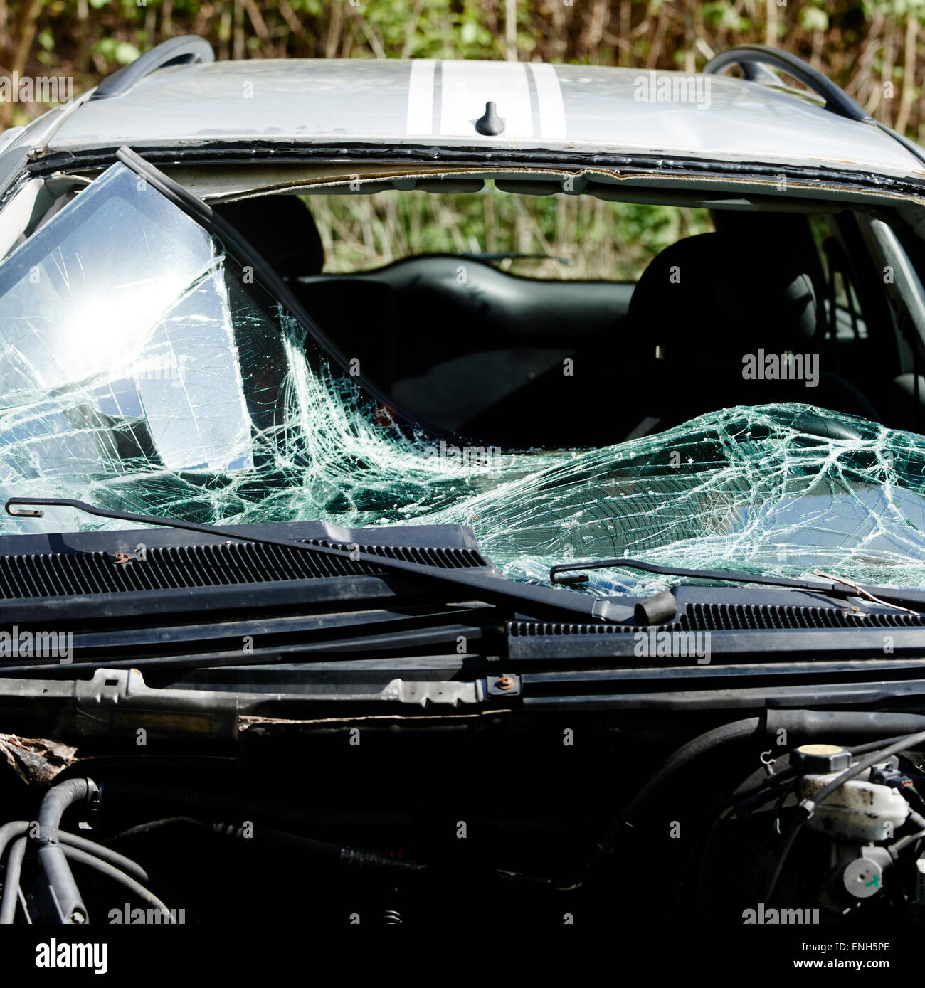 Junk Wrecked Car with Parts Removed in Wrecking Yard Stock Photo - Alamy