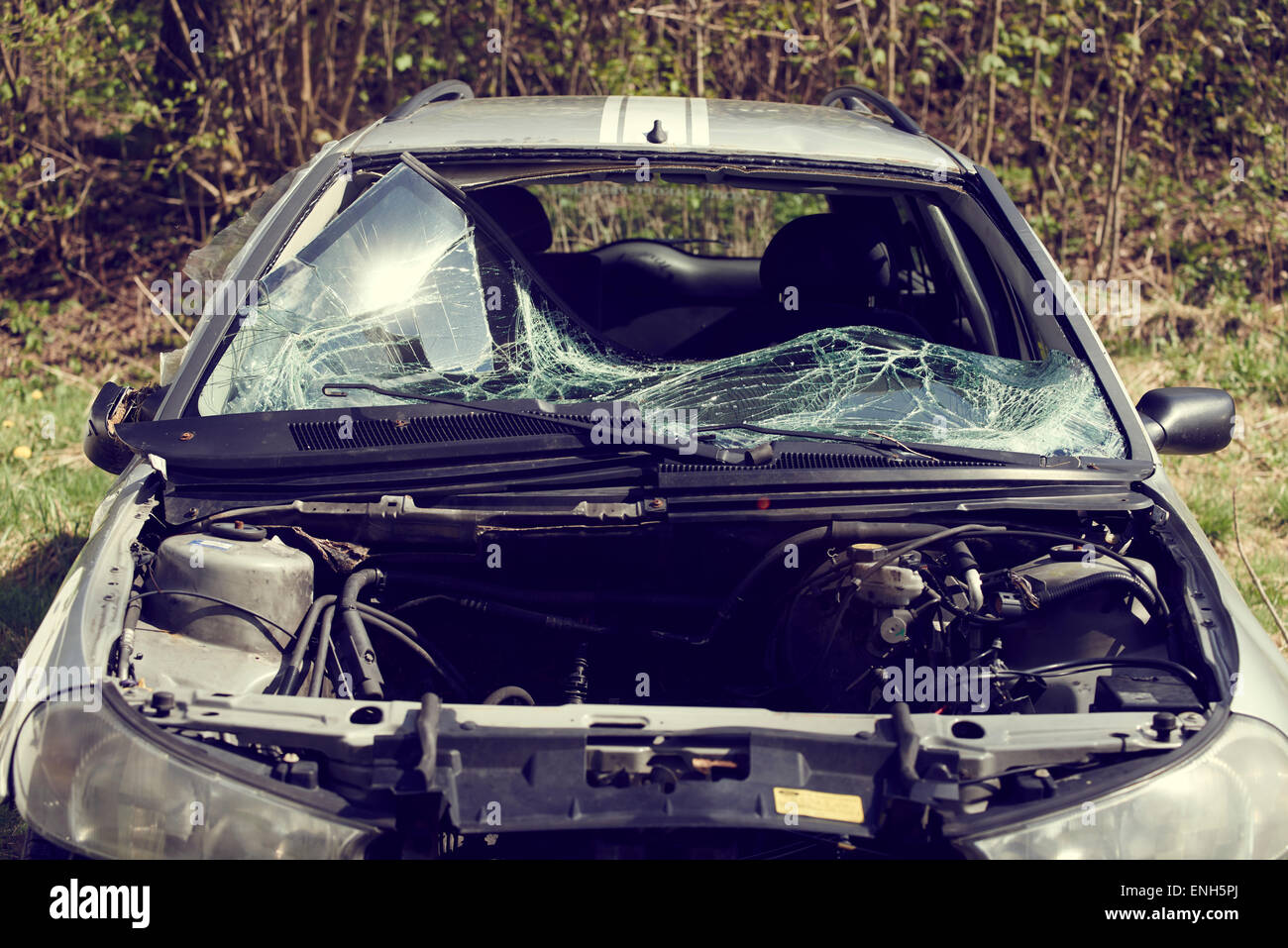 Junk Wrecked Car with Parts Removed in Wrecking Yard Stock Photo - Alamy
