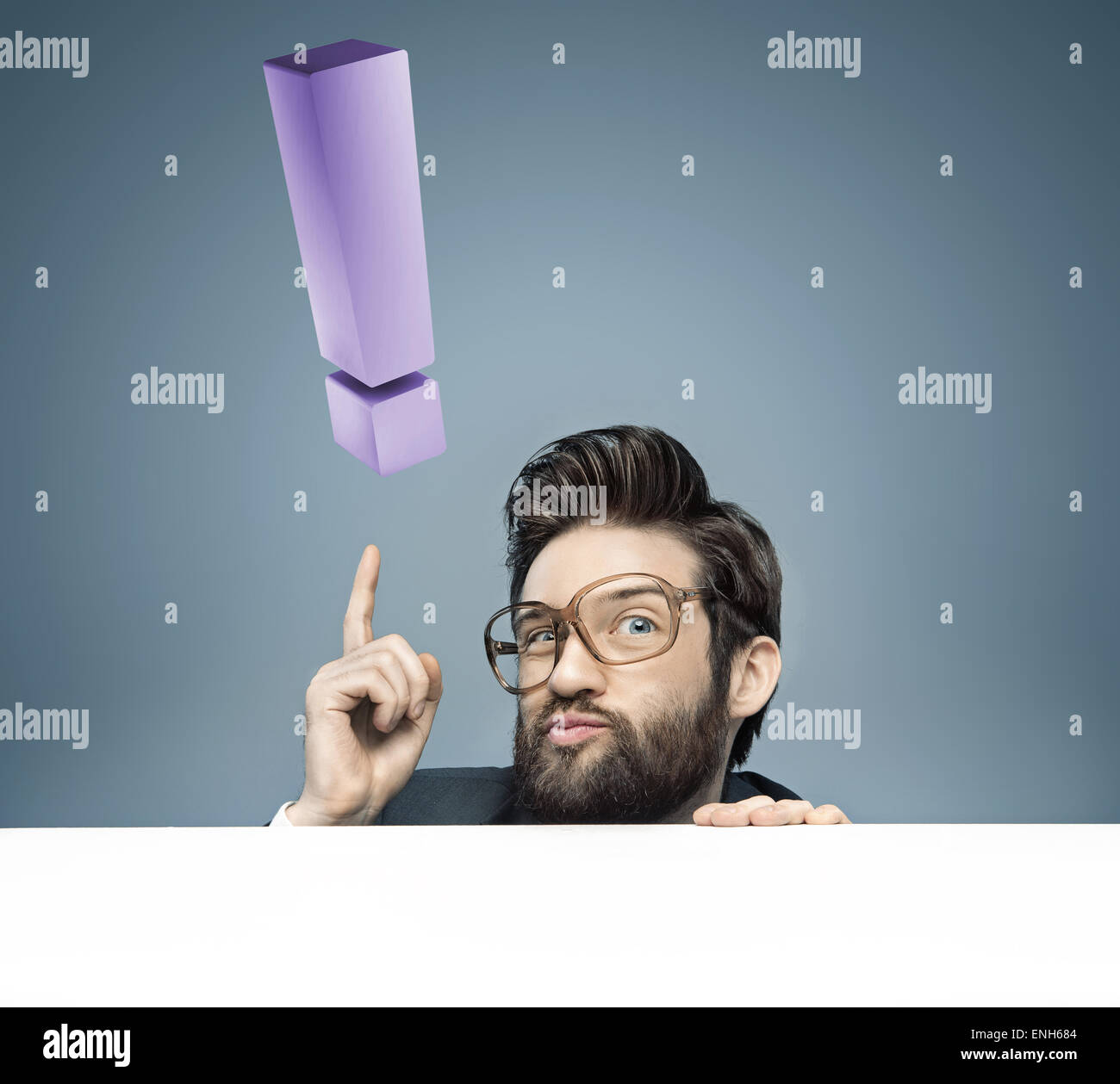 Portrait of a man with a huge exclamation mark Stock Photo - Alamy