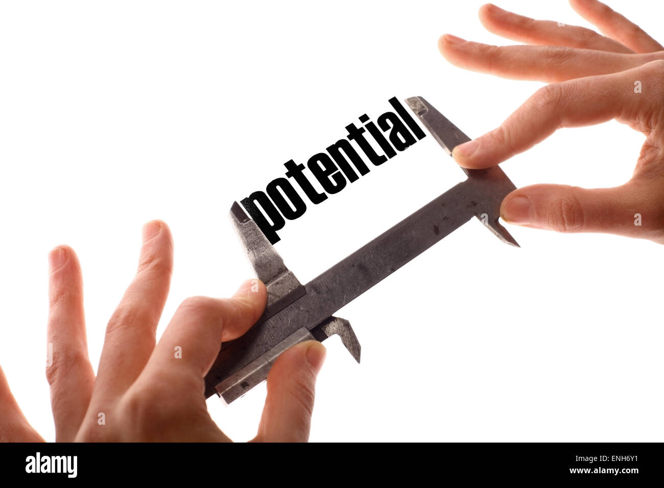 Color horizontal shot of two hands holding a caliper and measuring the ...