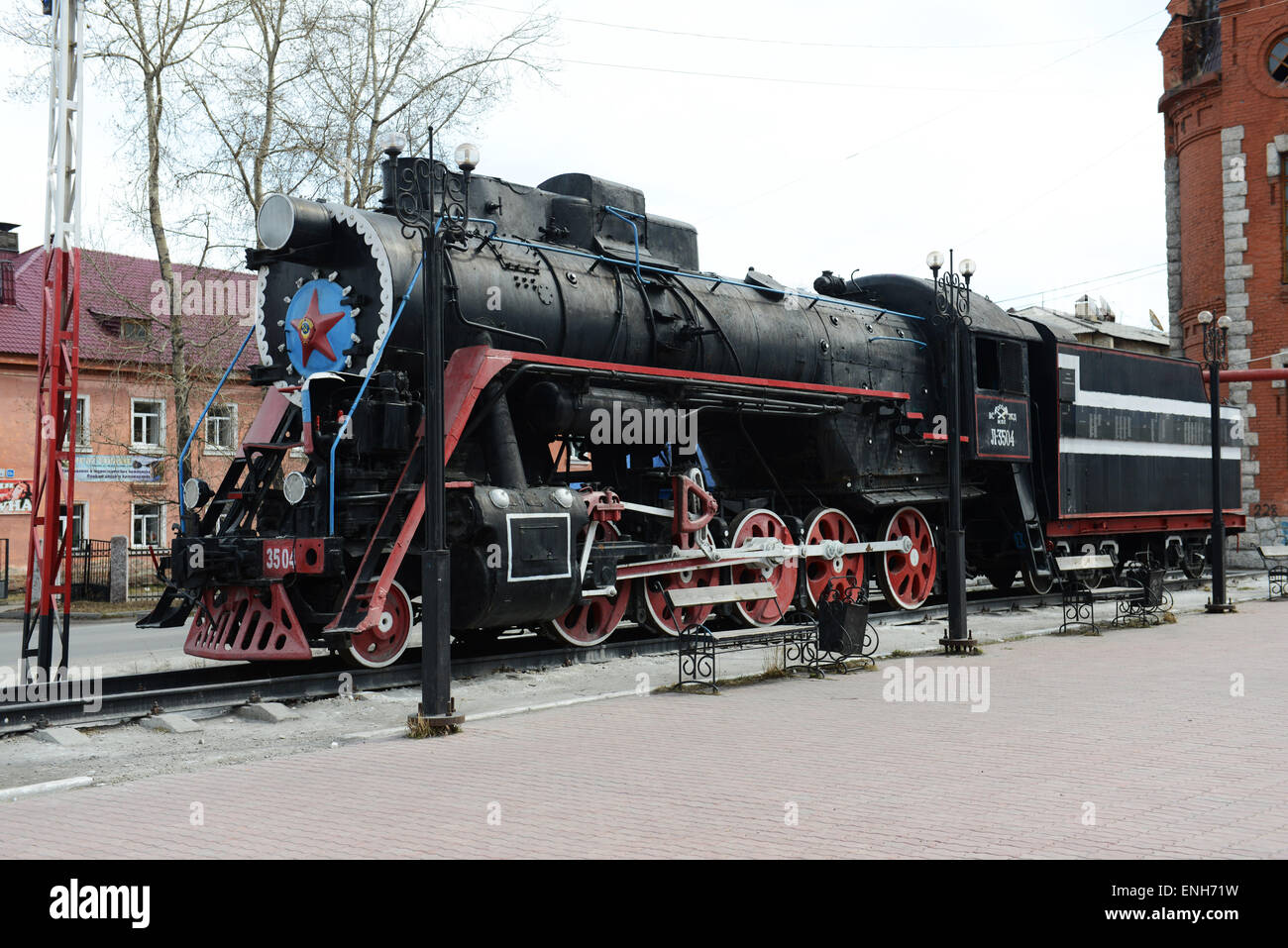 An old Russian locomotive used in the early - mid 20th century leading ...