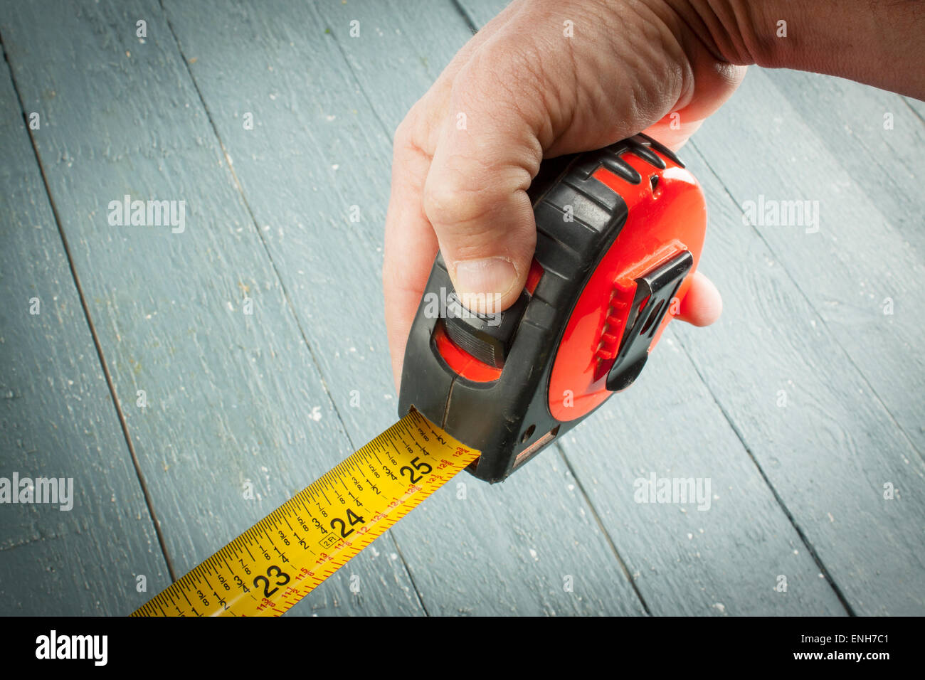 A tape measure extended to 25 inches Stock Photo - Alamy