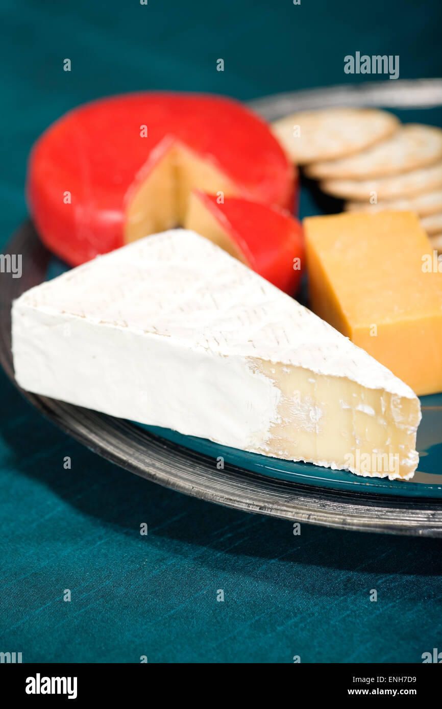 Smoked Baby Brie, Gouda and Smoked Cheddar cheese, along with water ...