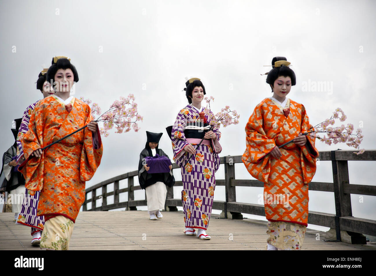 Japanese women dressed in traditional period kimono take part in a ...