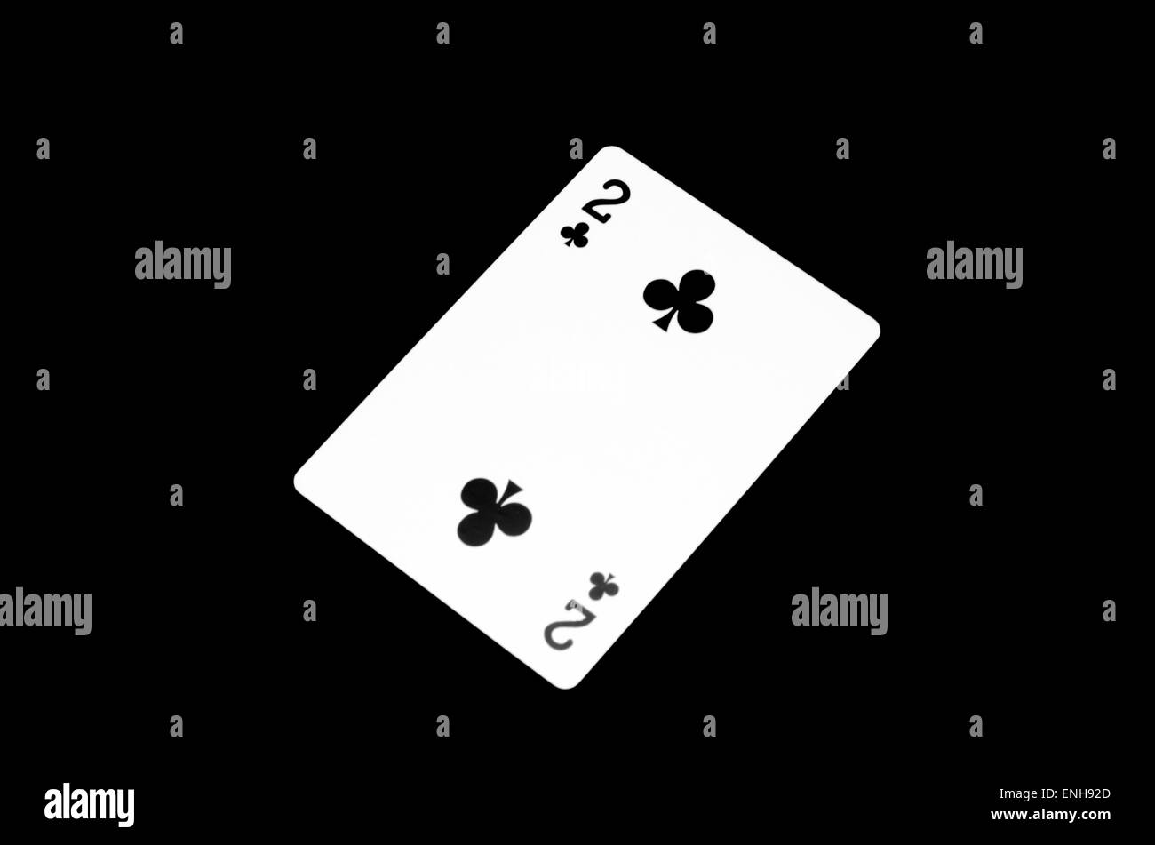 number two clover card isolated on black background Stock Photo - Alamy