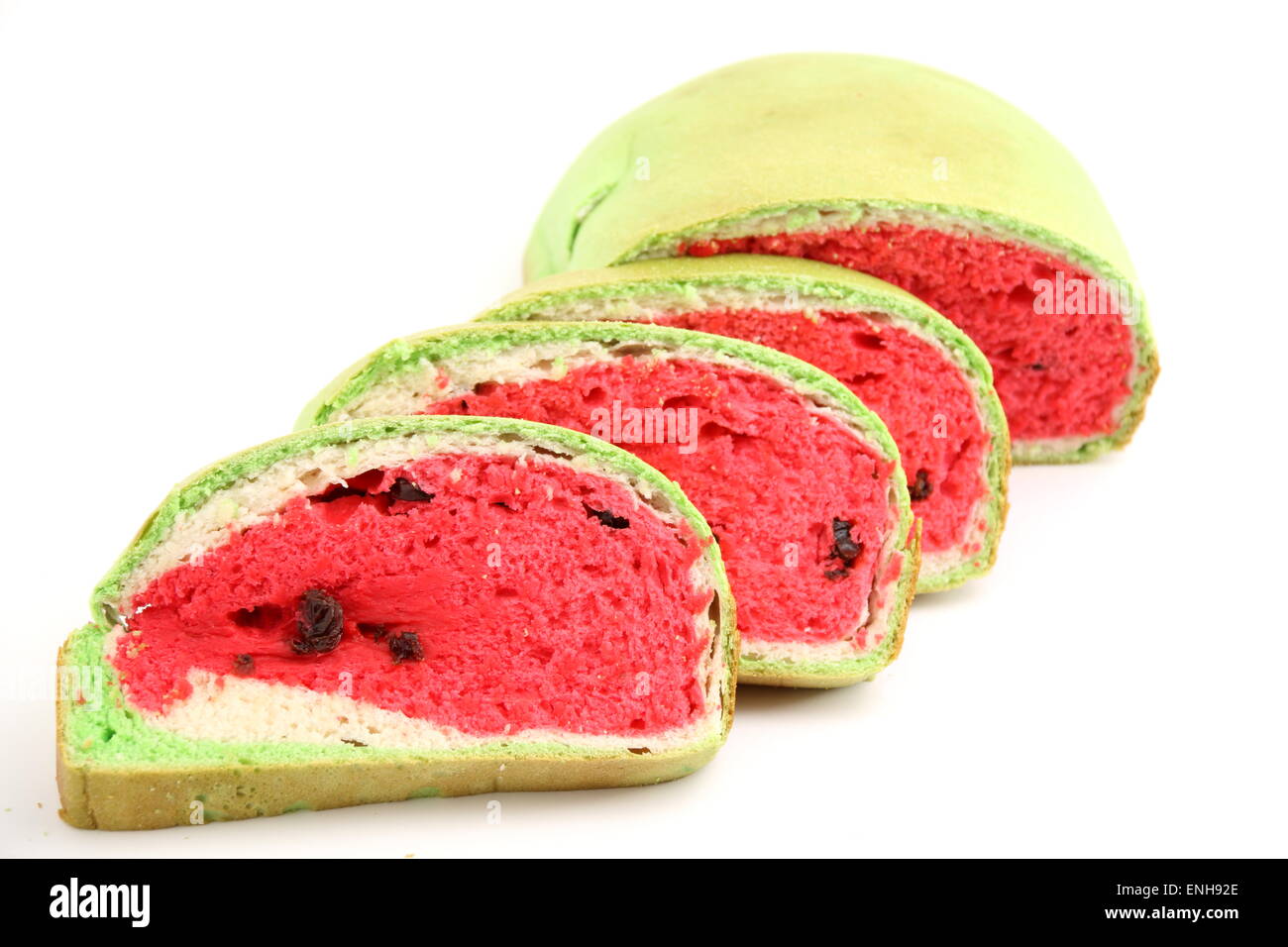 Sliced raisin red bread on white background Stock Photo - Alamy