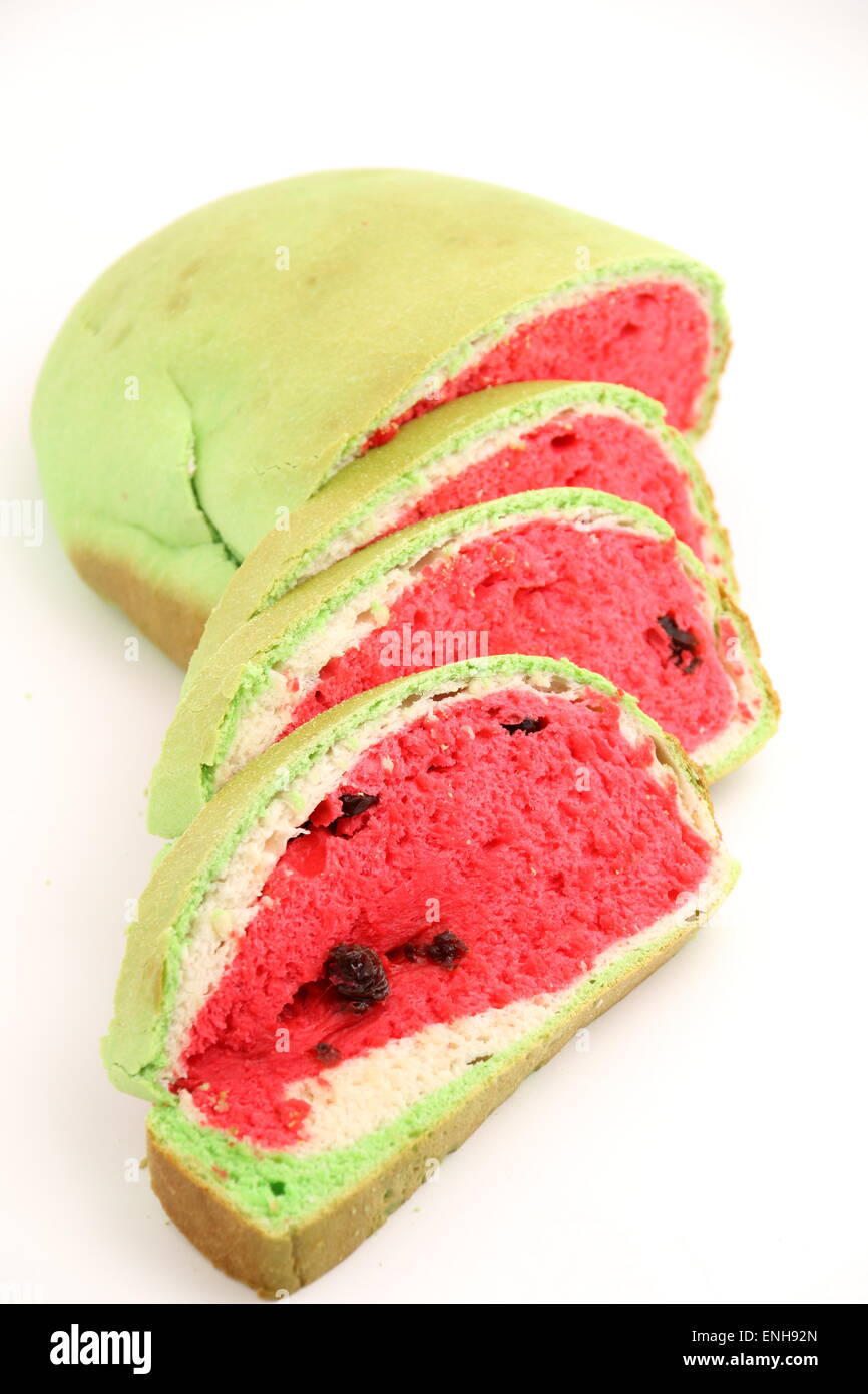 Sliced raisin red bread on white background Stock Photo - Alamy