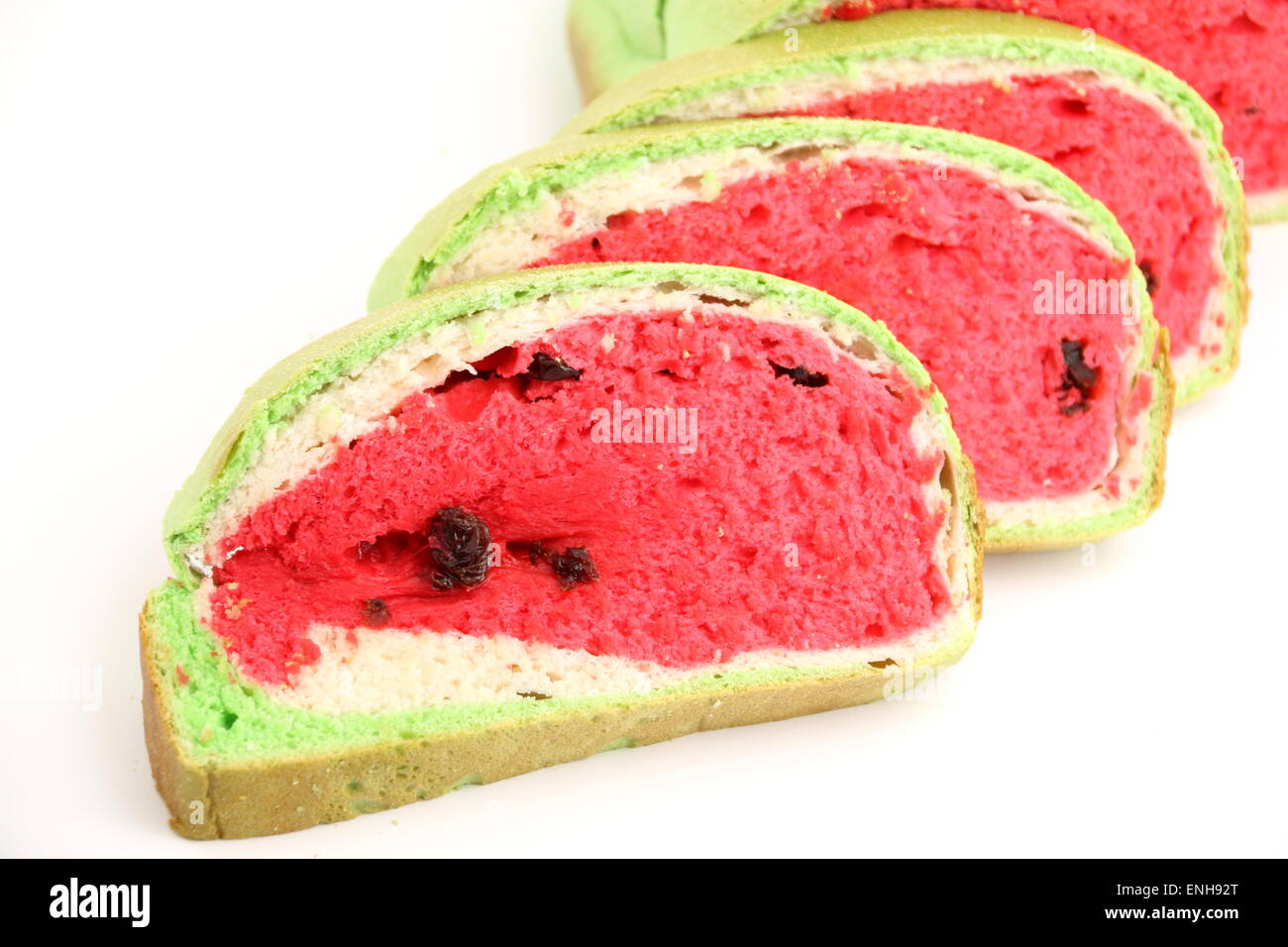 Sliced raisin red bread on white background Stock Photo - Alamy