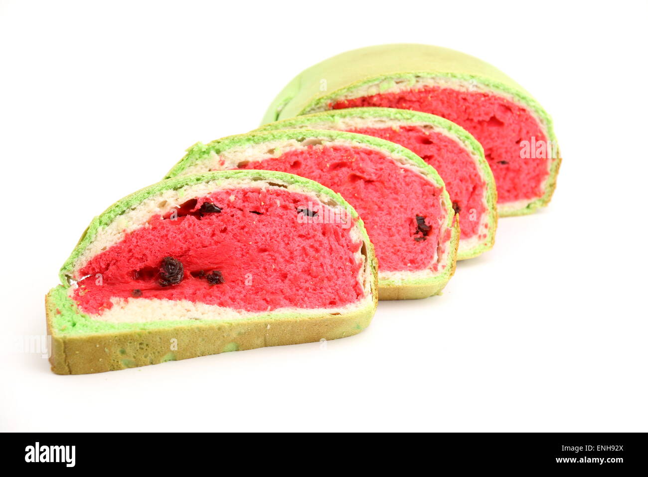 Sliced raisin red bread on white background Stock Photo - Alamy