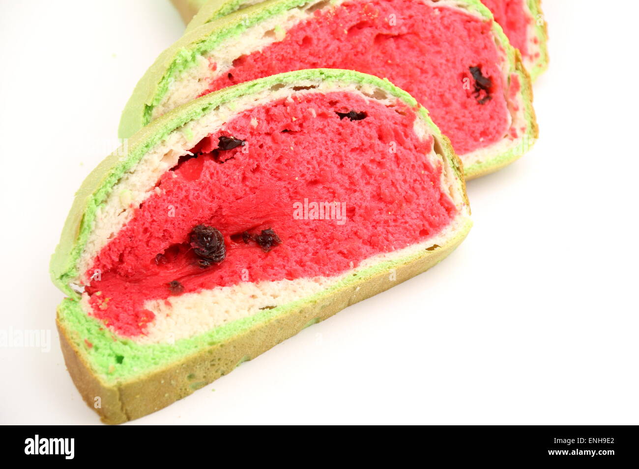 Sliced raisin red bread on white background Stock Photo - Alamy