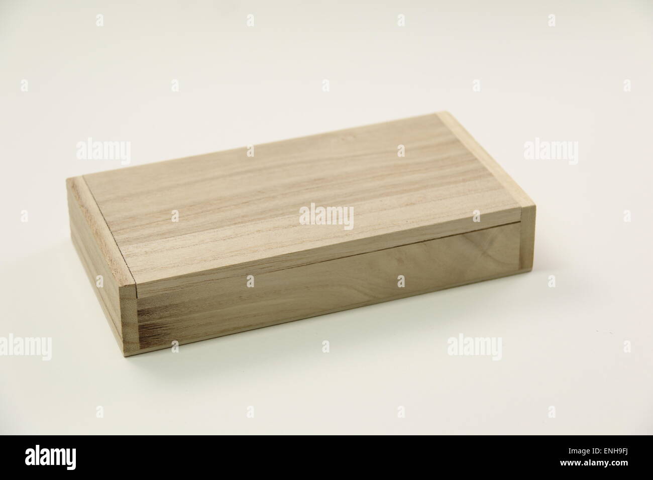 A small wooden box isolated on white Stock Photo - Alamy