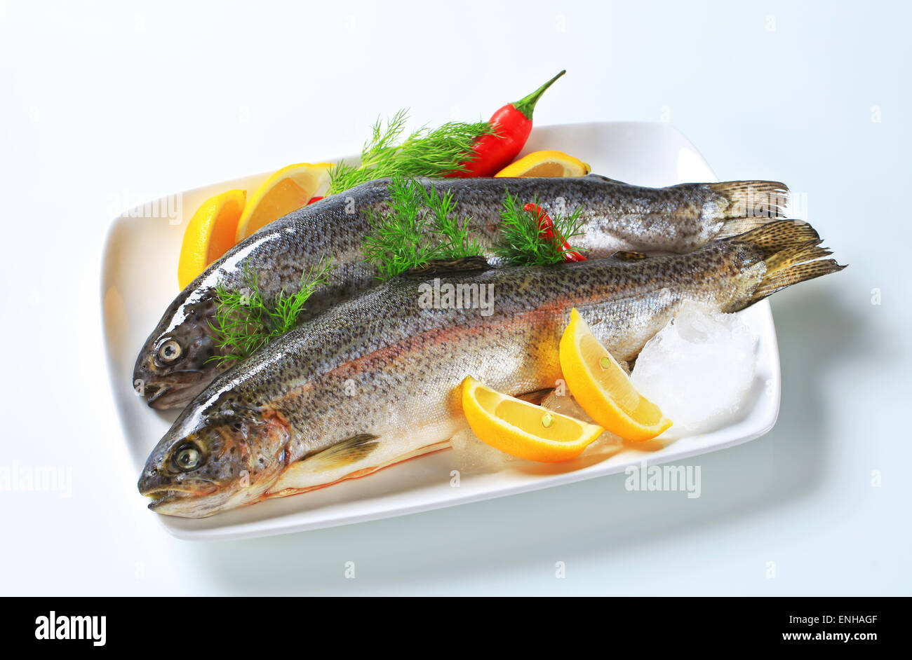 Studio shot of two fresh trout Stock Photo - Alamy