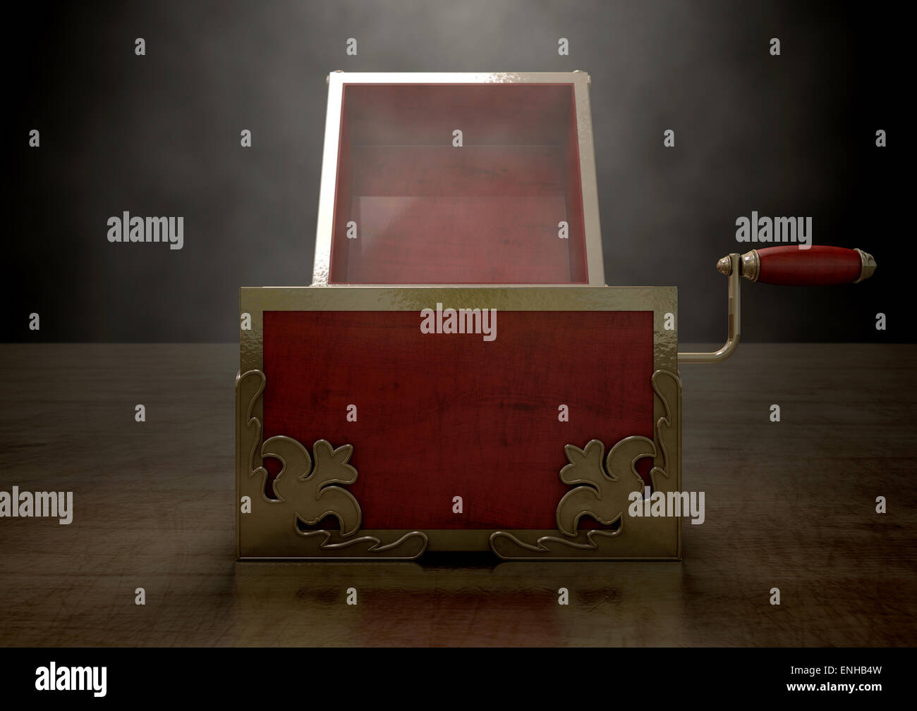 An ornate antique open jack-in-the-box mad of red wood and gold ...