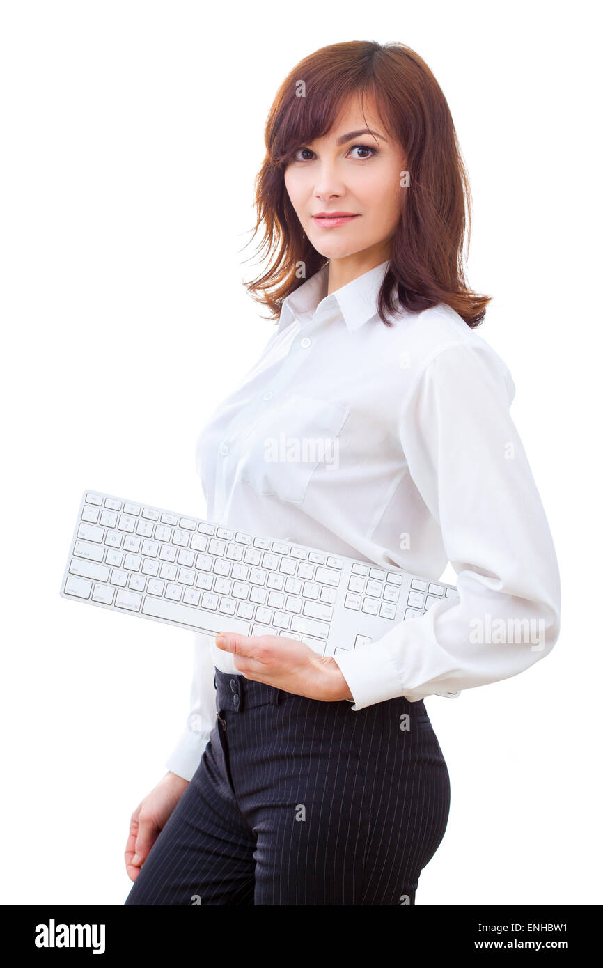 Woman in white shirt with computer keyboard Stock Photo - Alamy