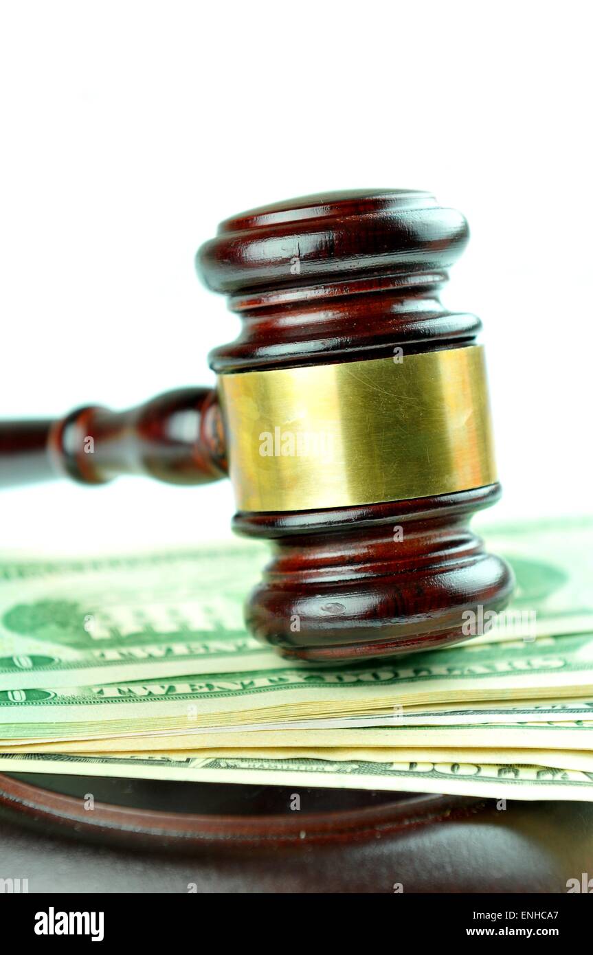 Auction concept with gavel on money background Stock Photo - Alamy