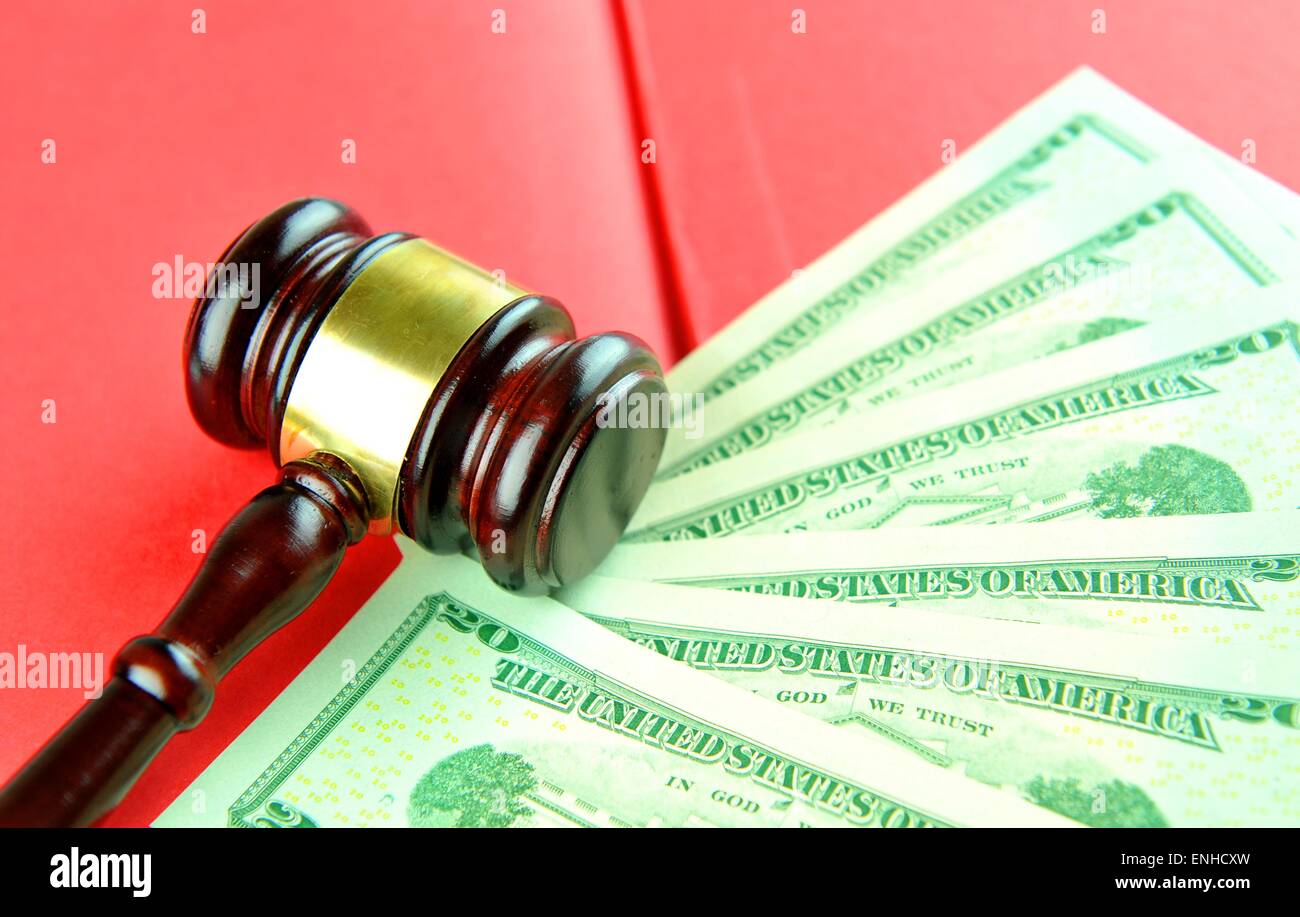 Auction concept with gavel on money background Stock Photo - Alamy